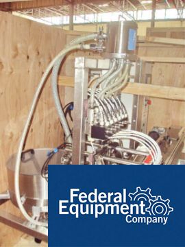 6 Head Gravity Filler System | Federal Equipment Company