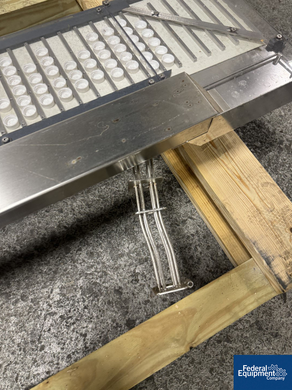 Cap Hopper Elevator | Federal Equipment Company